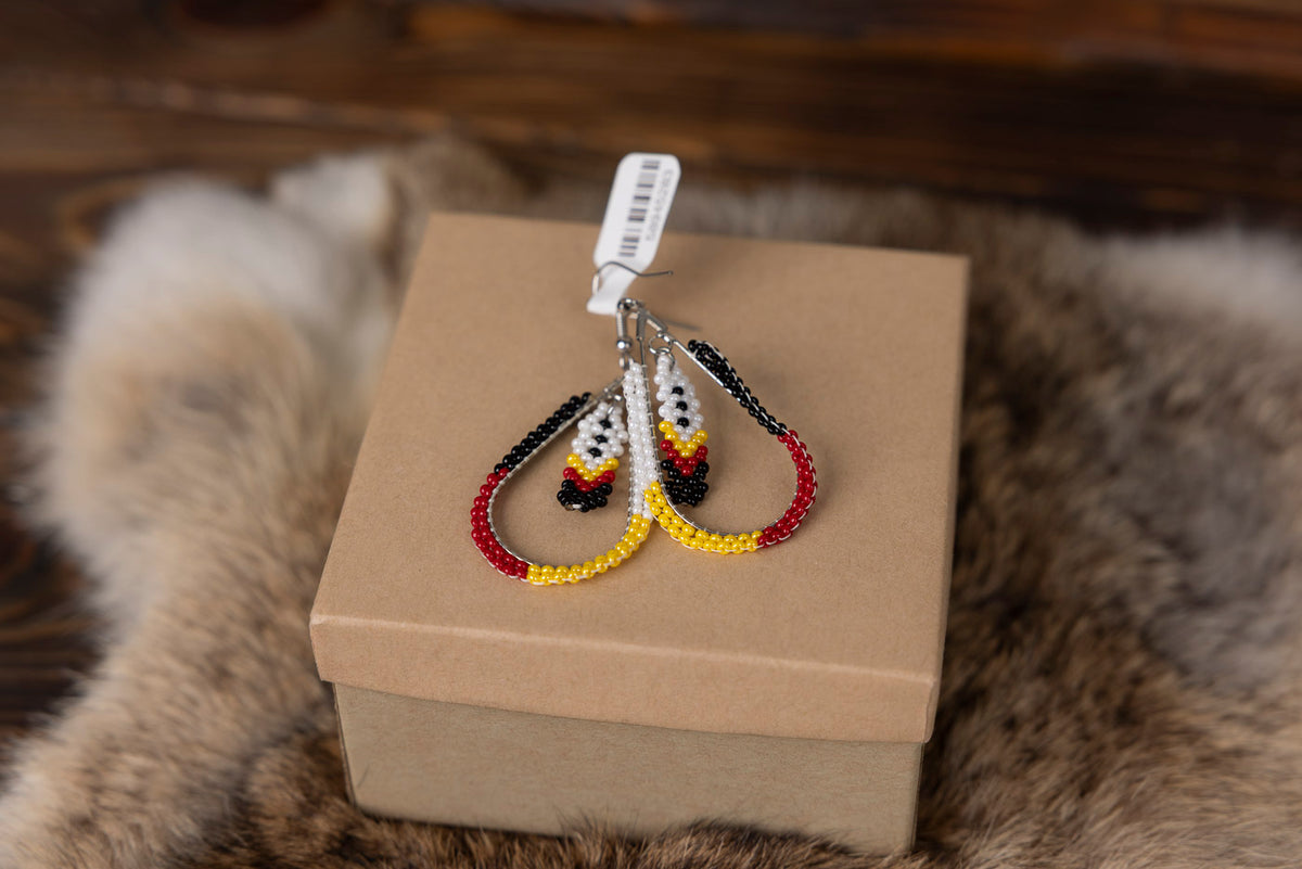 Medicine Wheel Color Hoop with Feather in Middle – Potawatomi Gift Shop